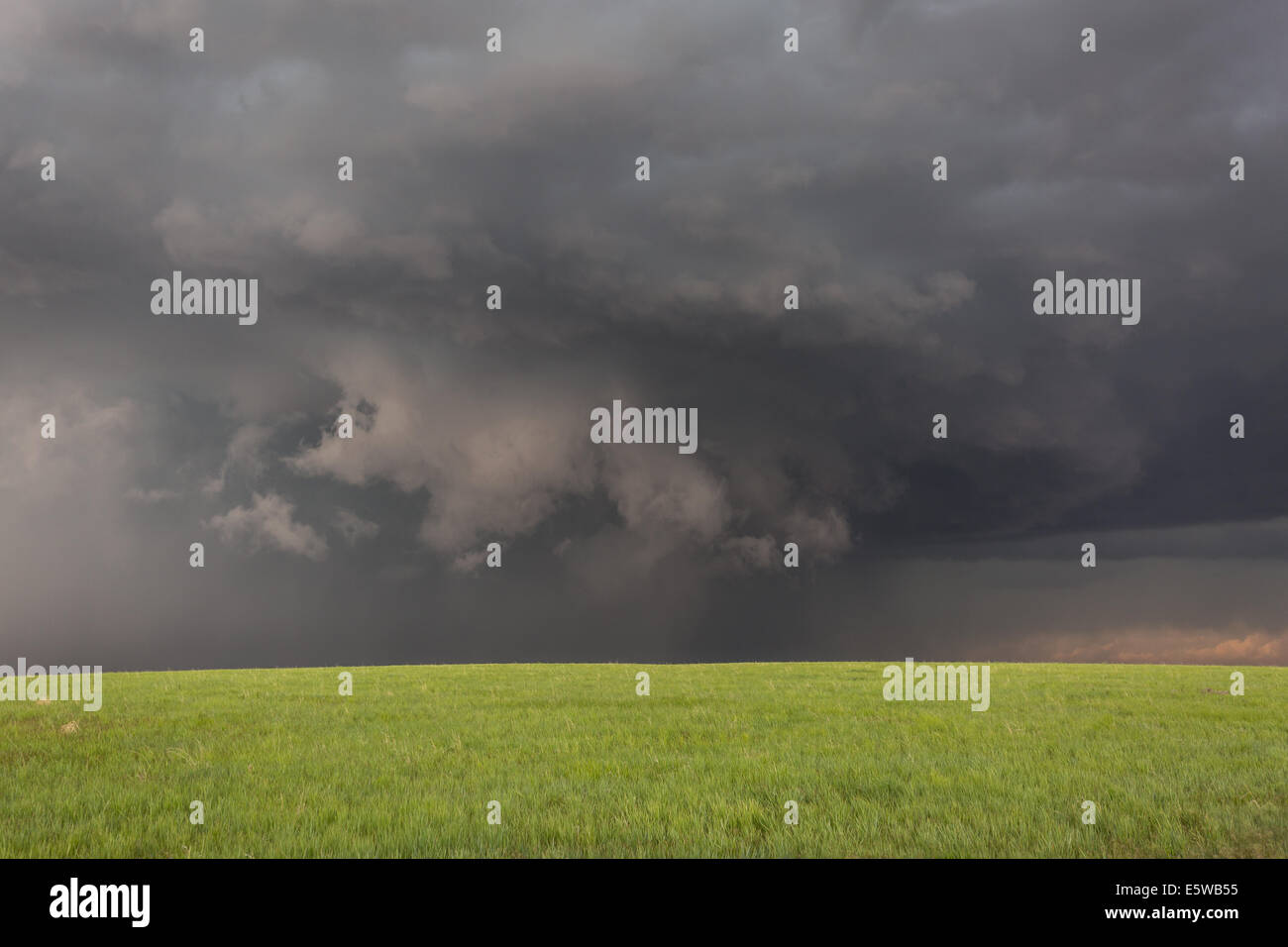A tornado warned supercell thunderstorm rolls across the plains of ...