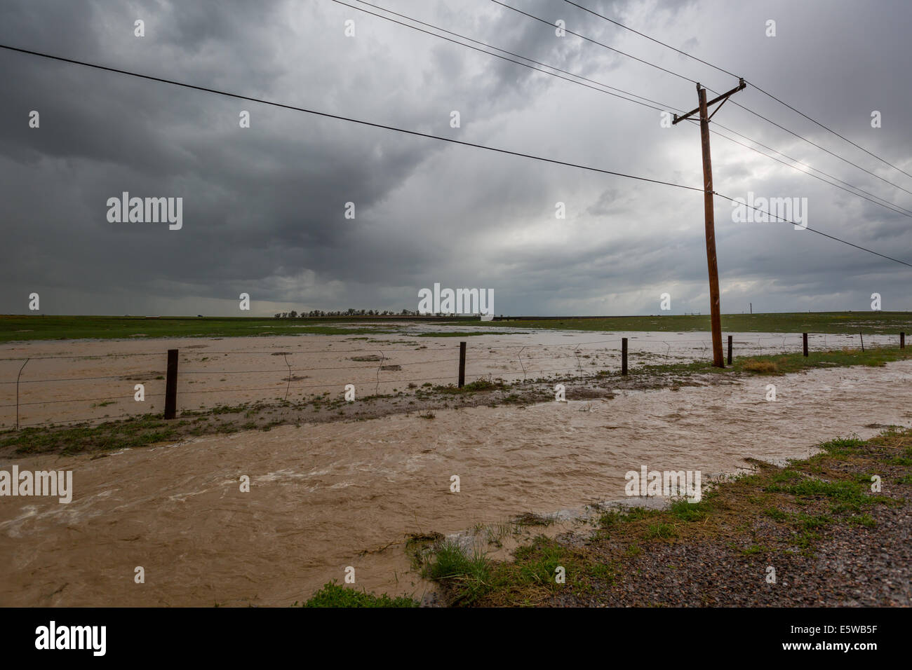 Sudden flash flooding dangerously overtakes a highway in Colorado Stock ...