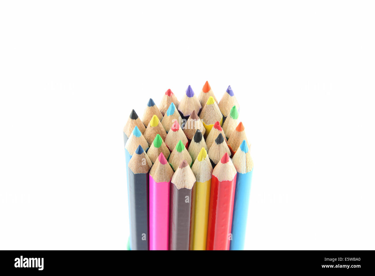 Mix colored crayons on a white background Stock Photo - Alamy