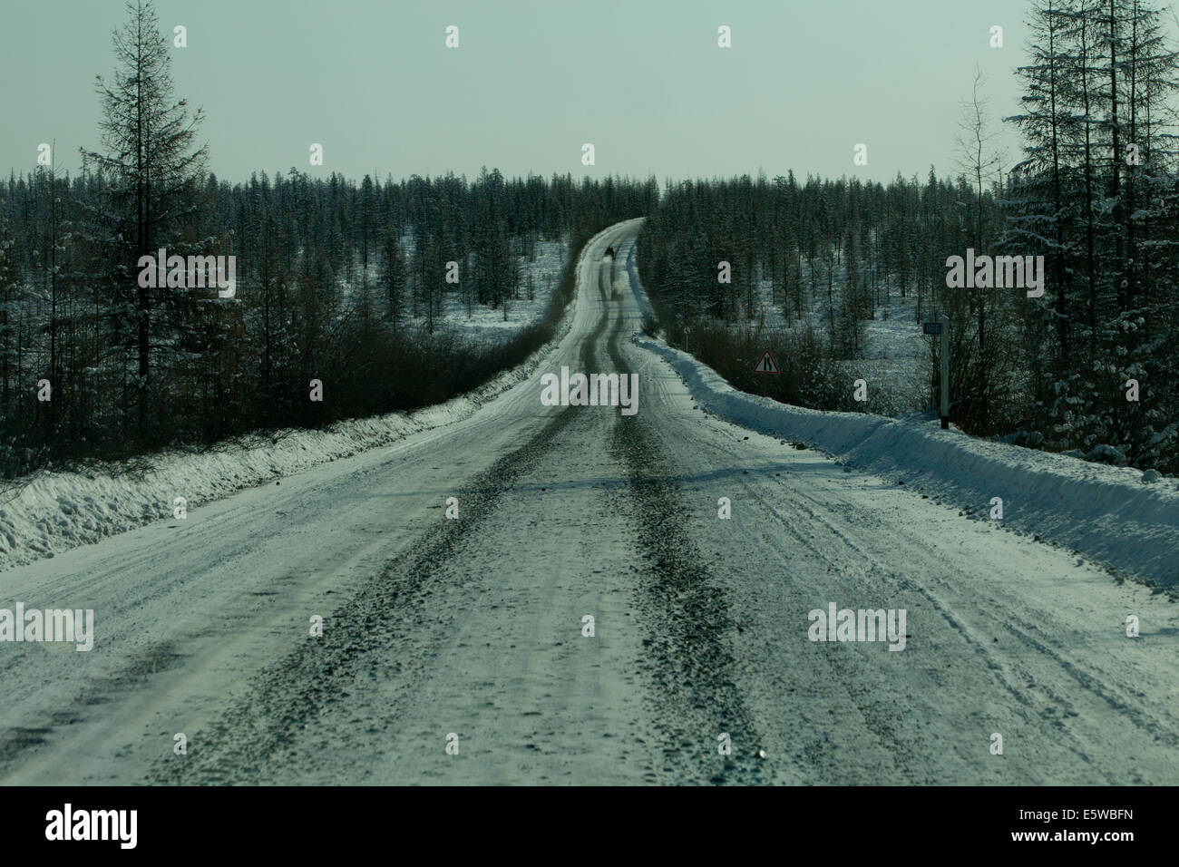 Straight snow ice road Siberia low shot desolate Stock Photo - Alamy