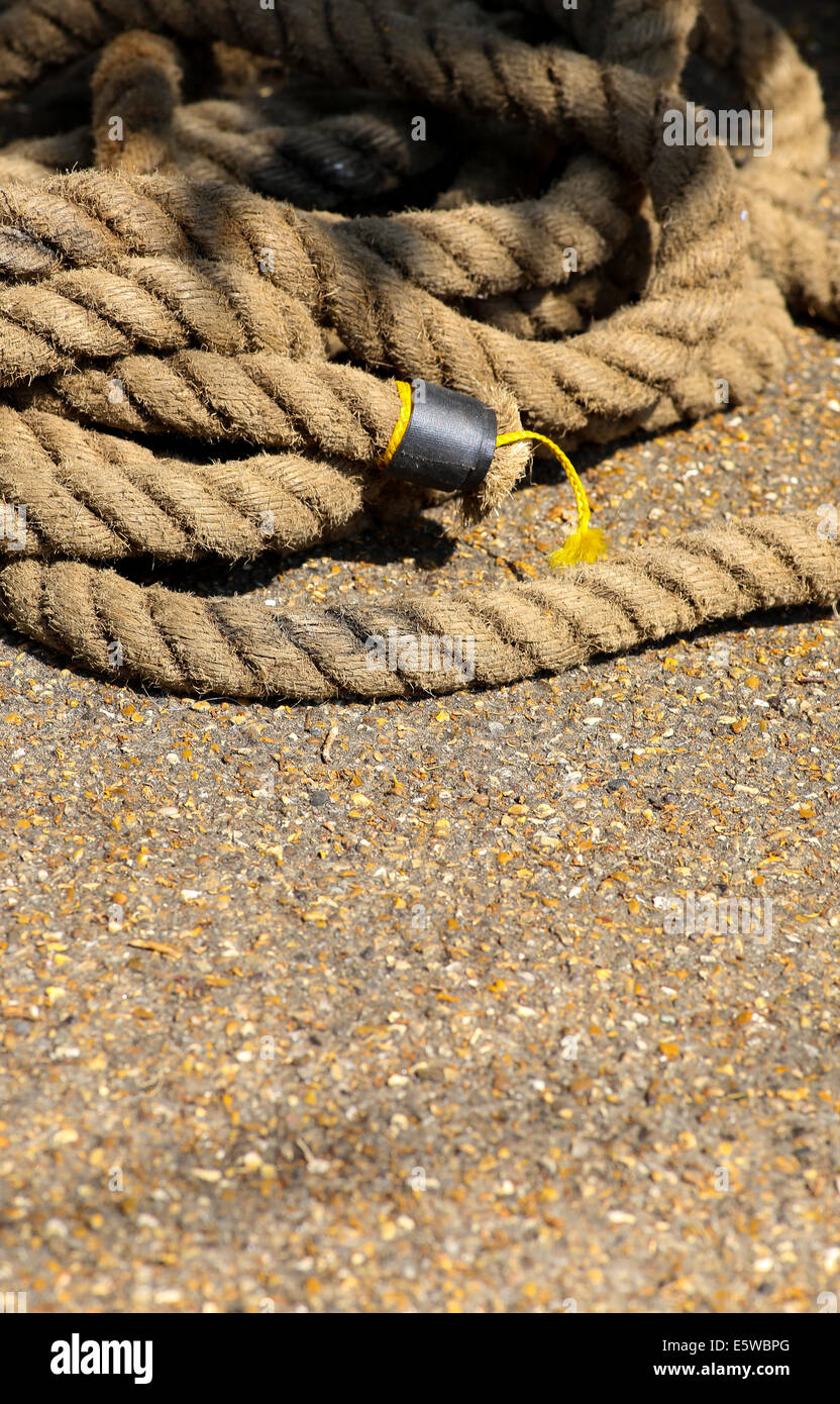 Heavy old rope for sale on the street antique market Stock Photo - Alamy