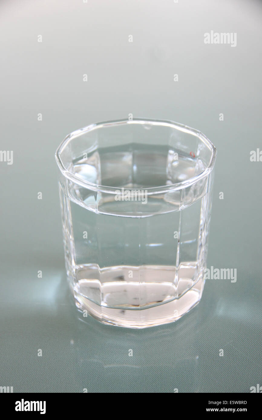 Glass of water is placed on the foods table Stock Photo - Alamy