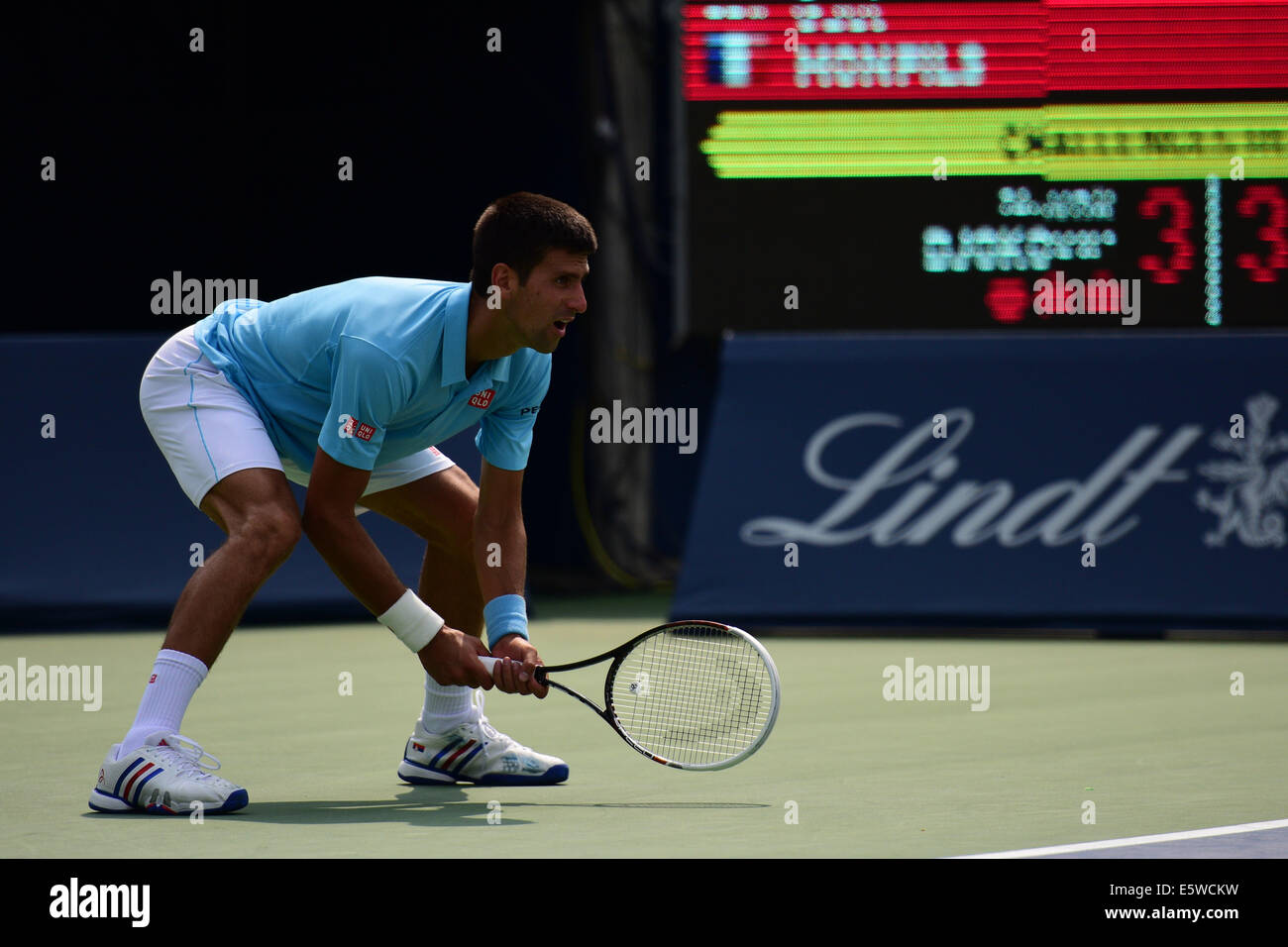 Novak djokovic return of serve hi-res stock photography and images - Alamy