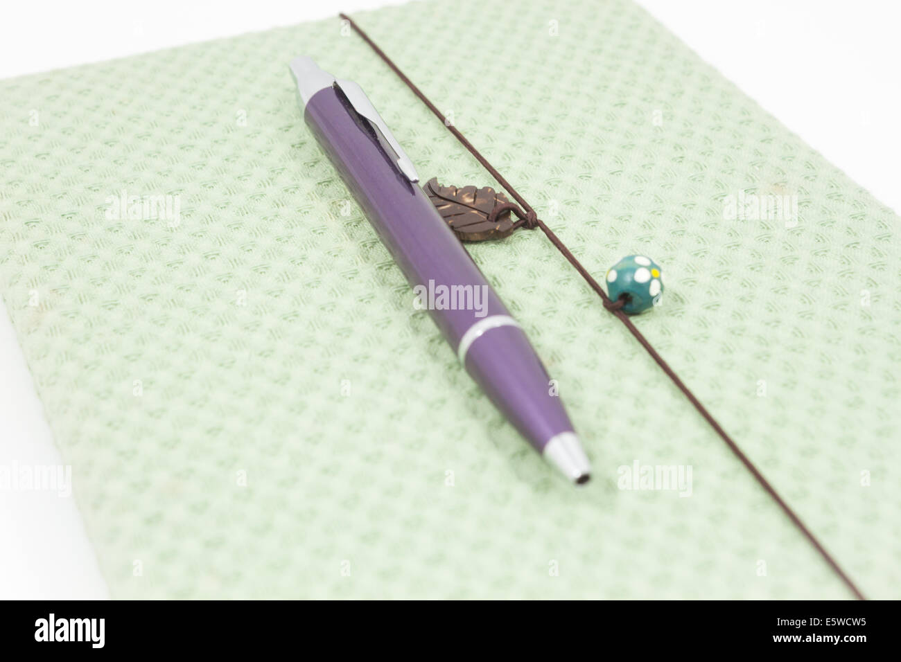 Handmade notebook with pen isolated on white background, stock photo ...