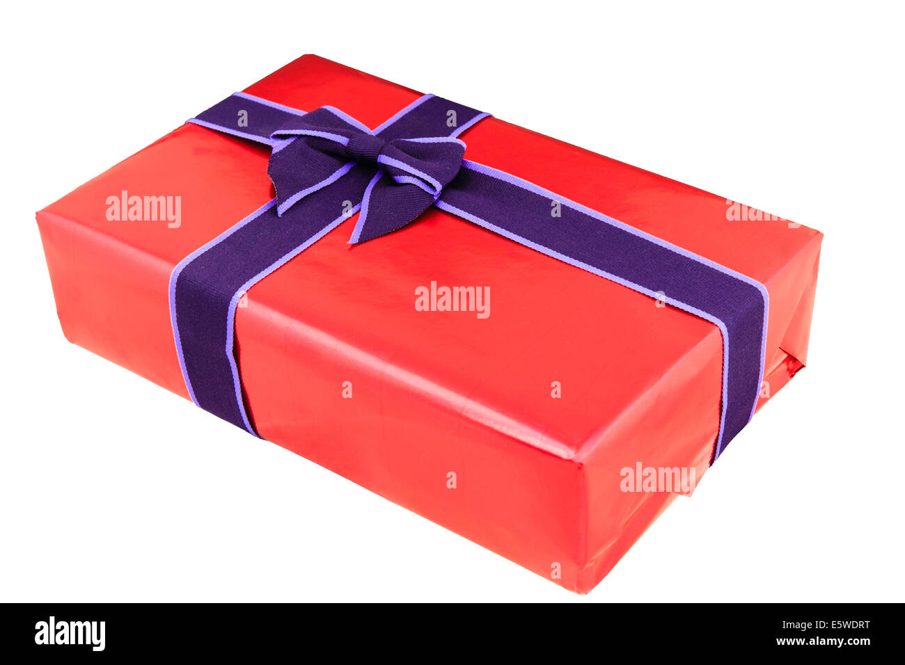 Present wrapped in red with blue ribbon Stock Photo - Alamy