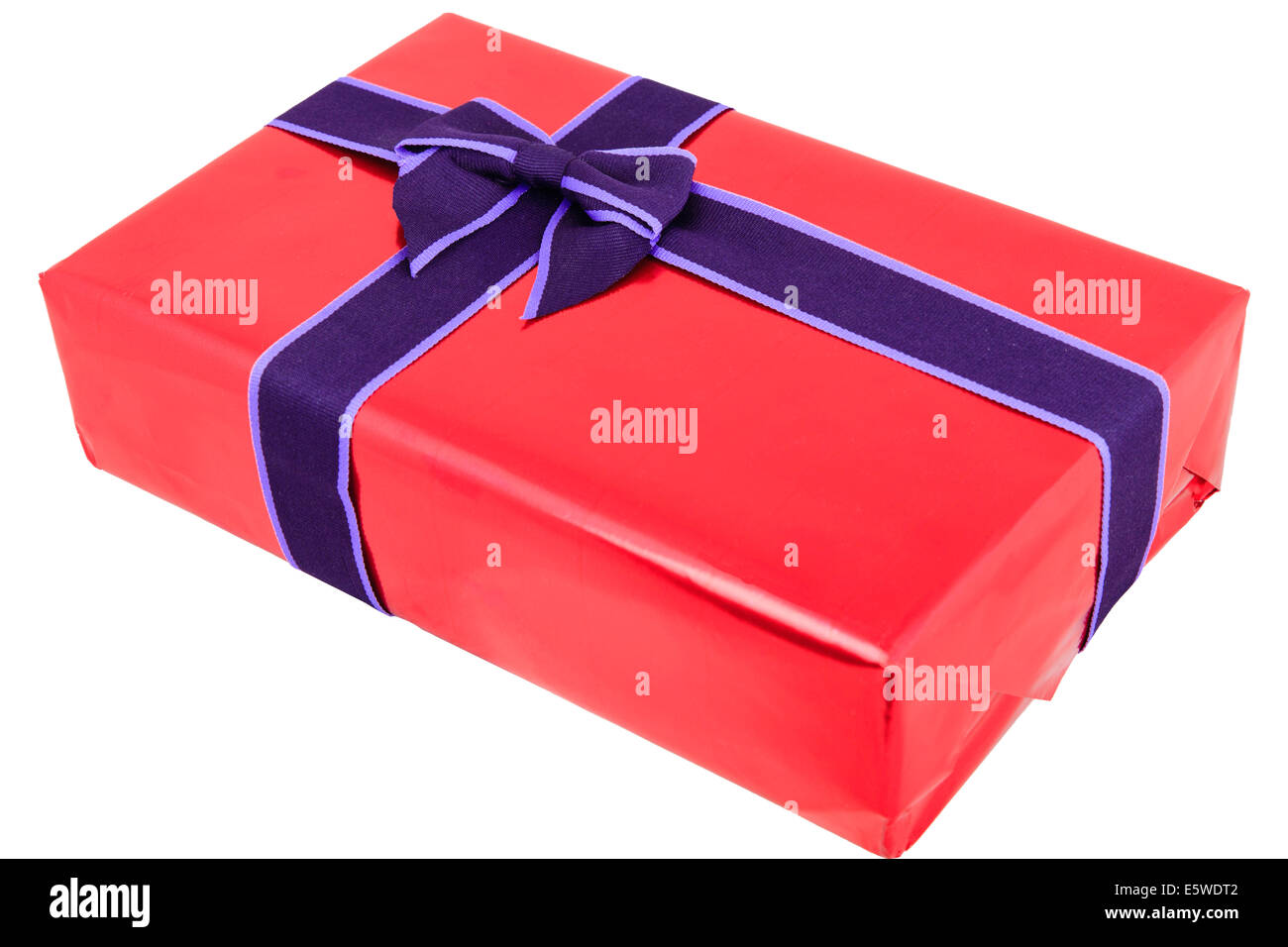 Present wrapped in red with blue ribbon Stock Photo - Alamy