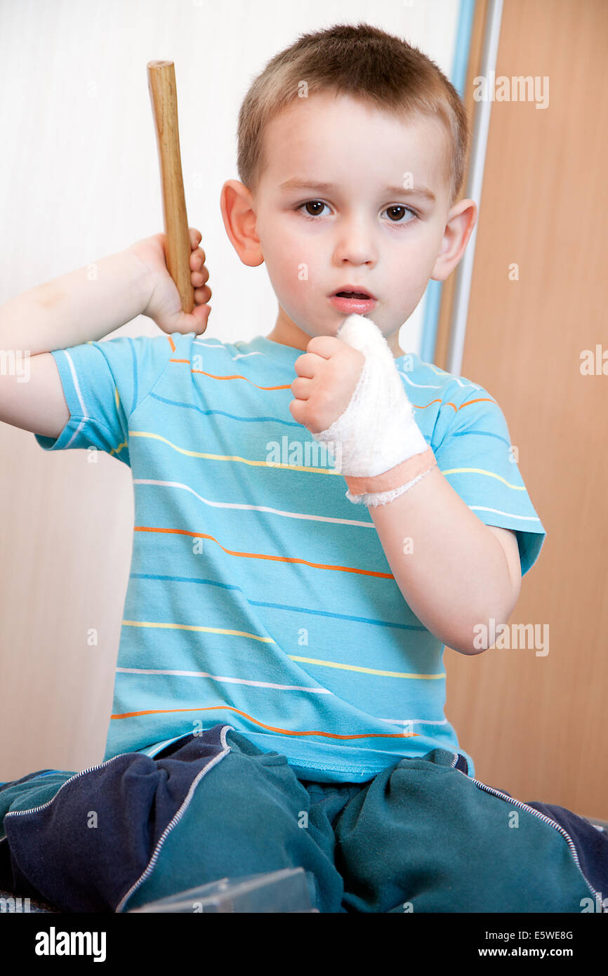 Boy with hammer hi-res stock photography and images - Alamy