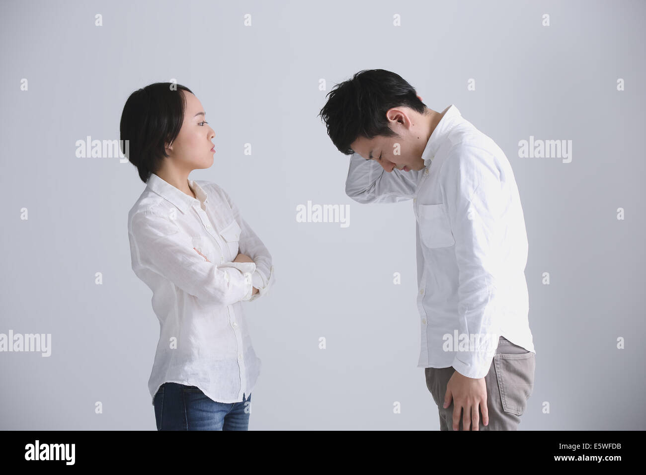 Young Japanese couple having an argument Stock Photo - Alamy