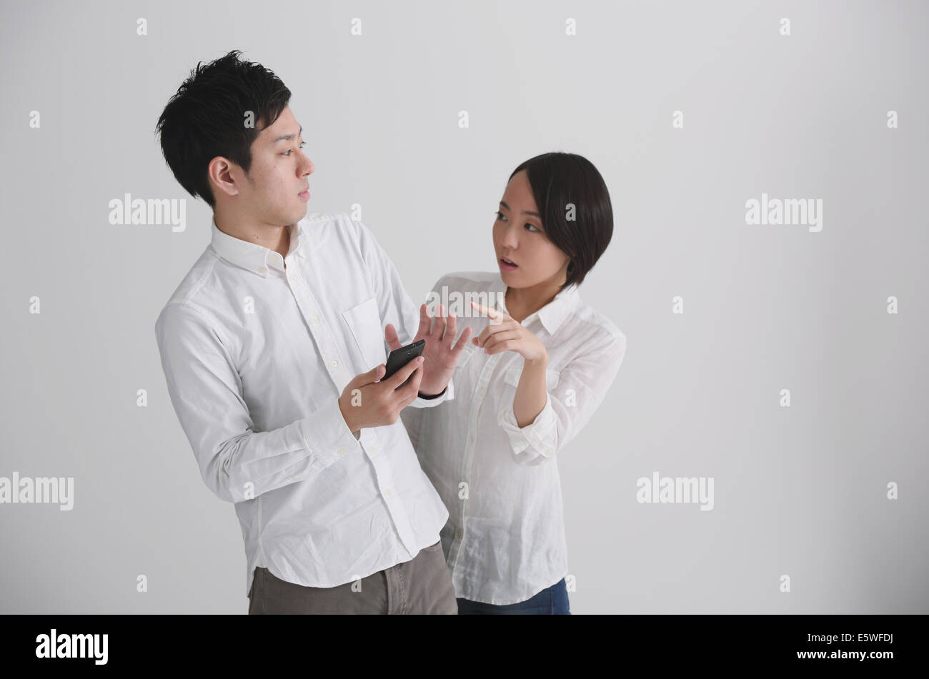 Young Japanese couple having an argument Stock Photo - Alamy