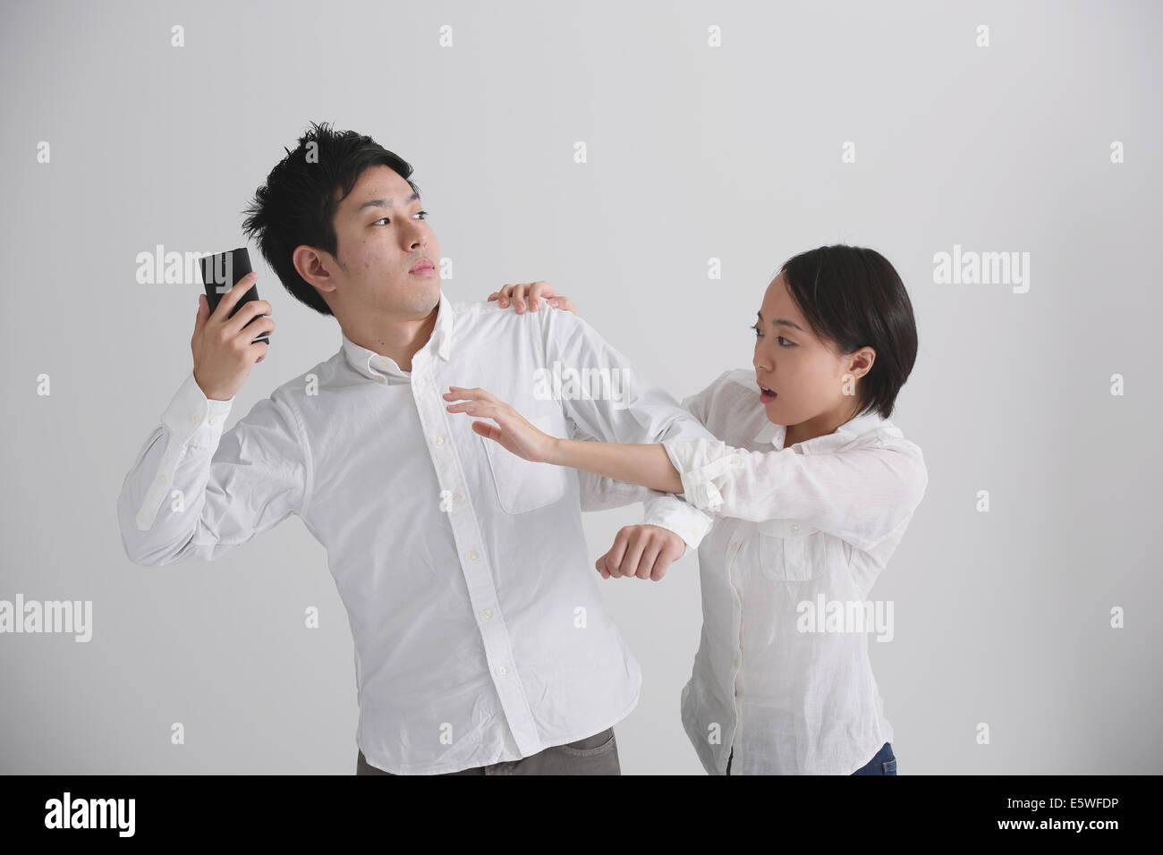 Young Japanese couple having an argument Stock Photo - Alamy