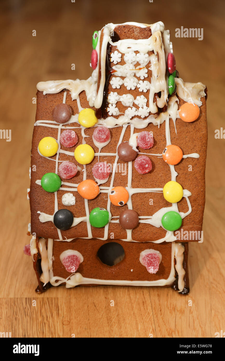 Small gingerbread house with candy Stock Photo - Alamy