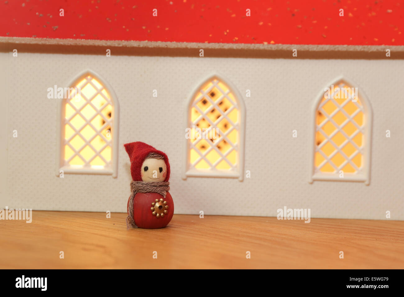 Small figure outside a church Stock Photo - Alamy