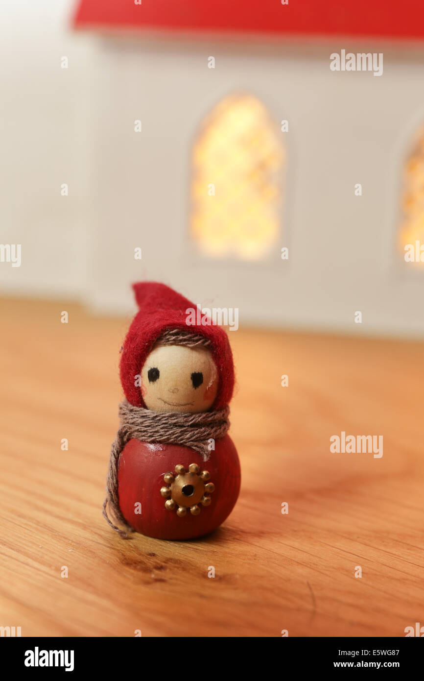 Small figure outside church Stock Photo - Alamy