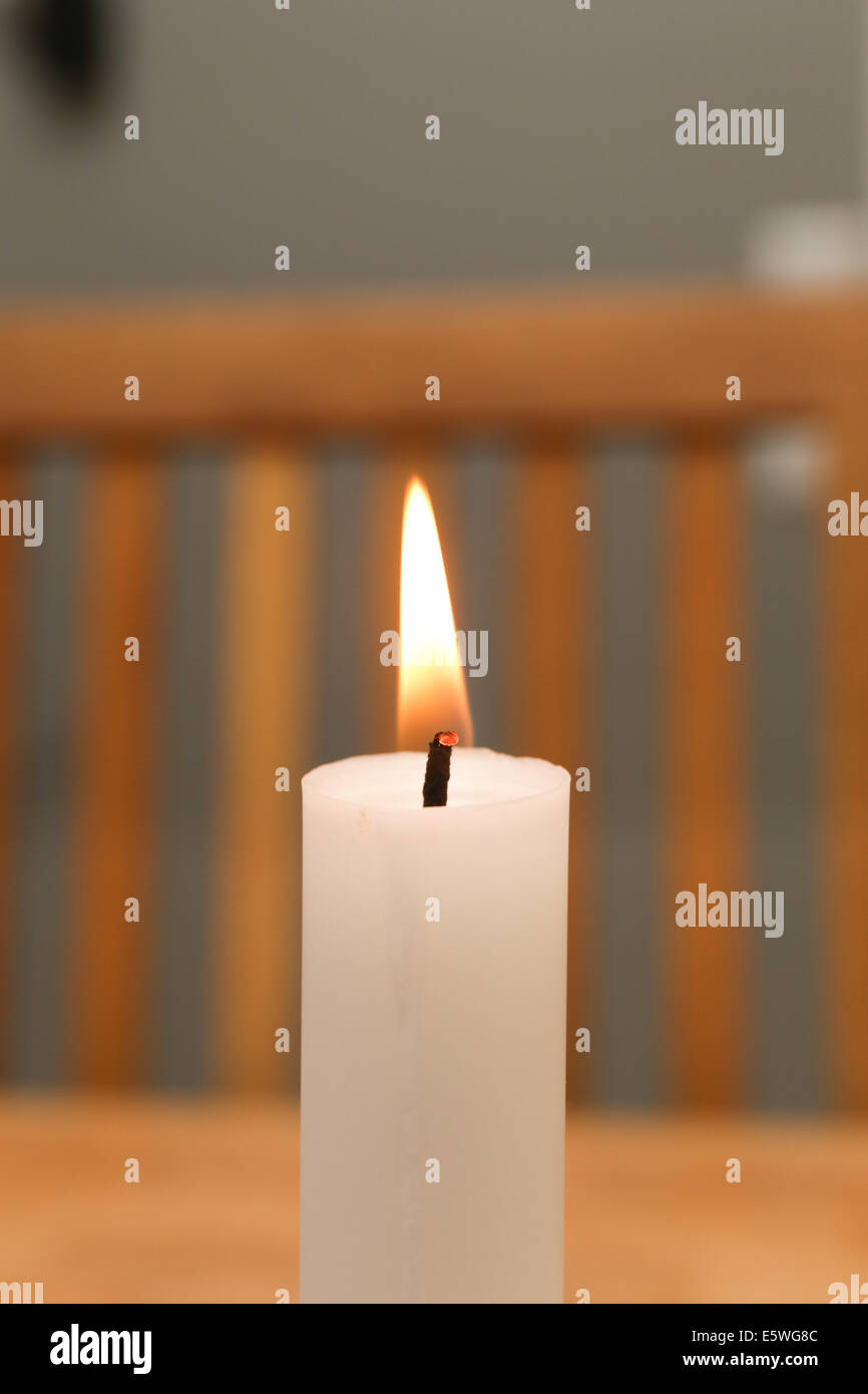 Lit candle burning hi-res stock photography and images - Alamy