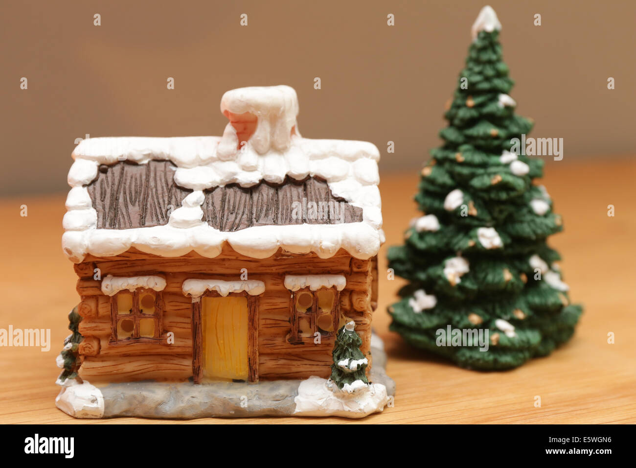 Small christmas scene with house and santa Stock Photo - Alamy