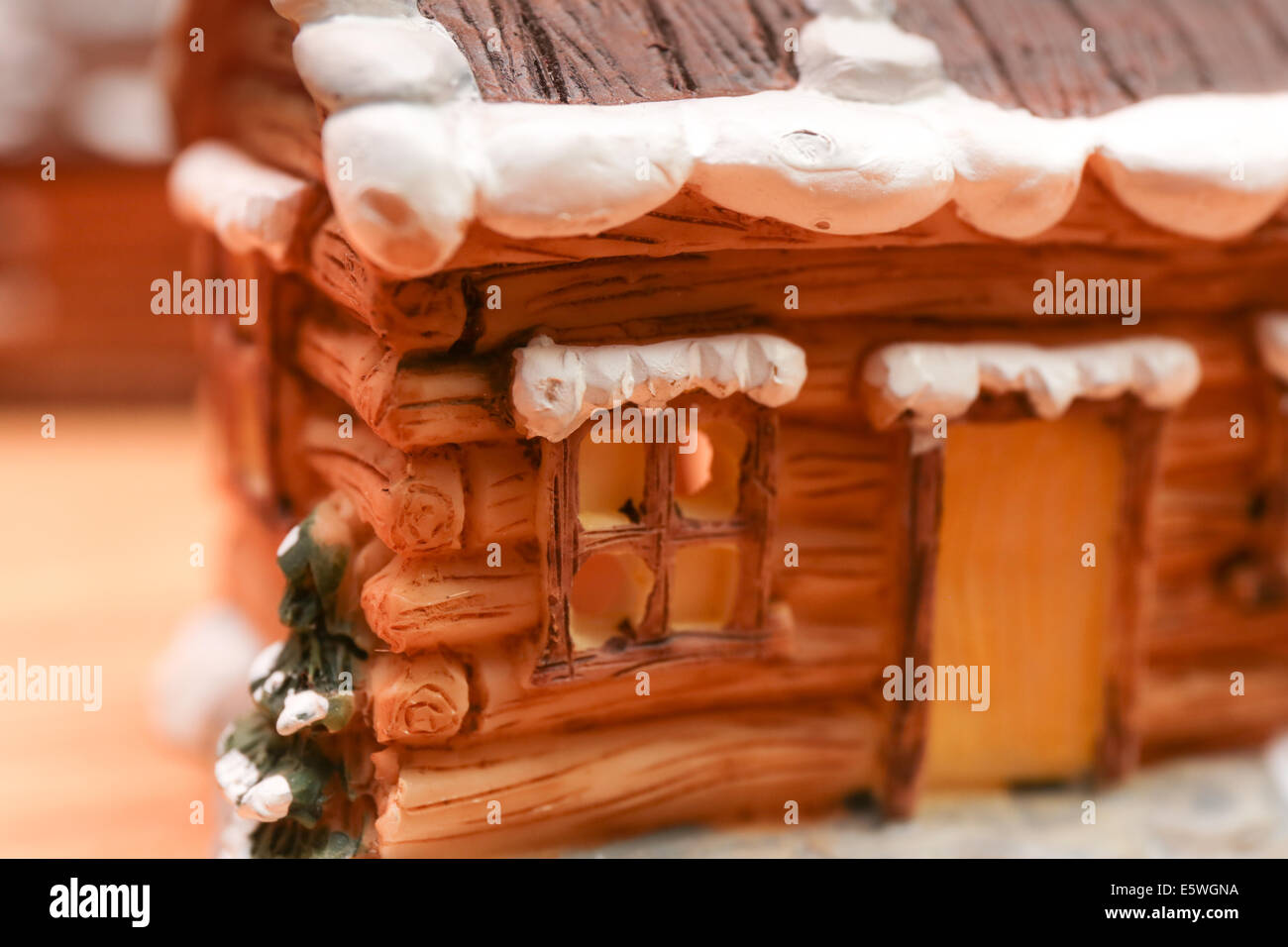 Small christmas scene with house and santa Stock Photo - Alamy