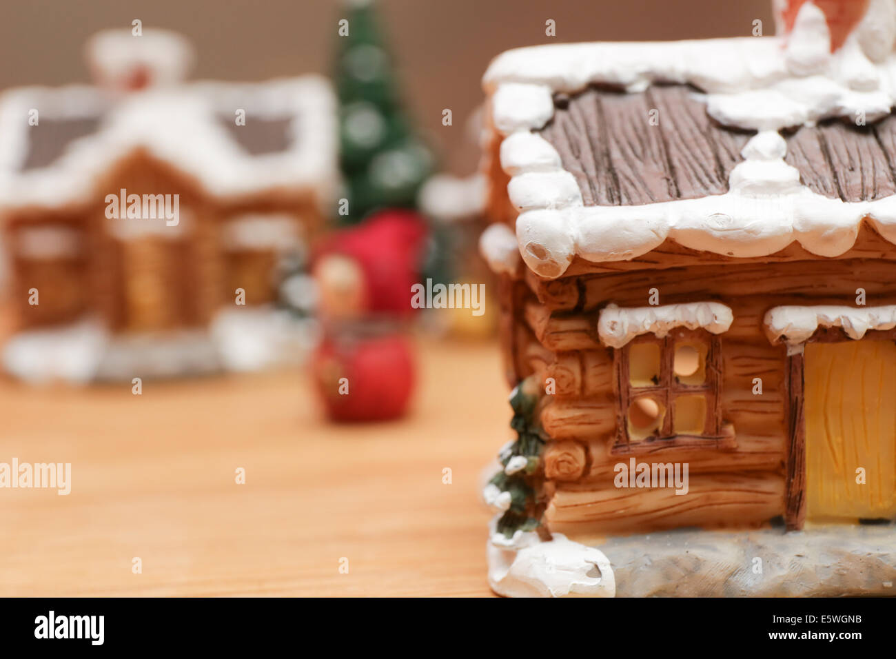 Small christmas scene with house and santa Stock Photo - Alamy