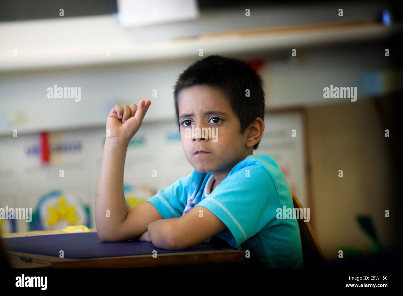 Raising finger classroom hi-res stock photography and images - Alamy