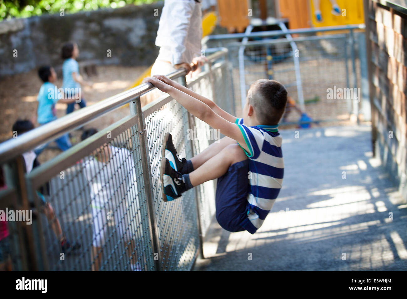 Children fighting playground school hi-res stock photography and images ...