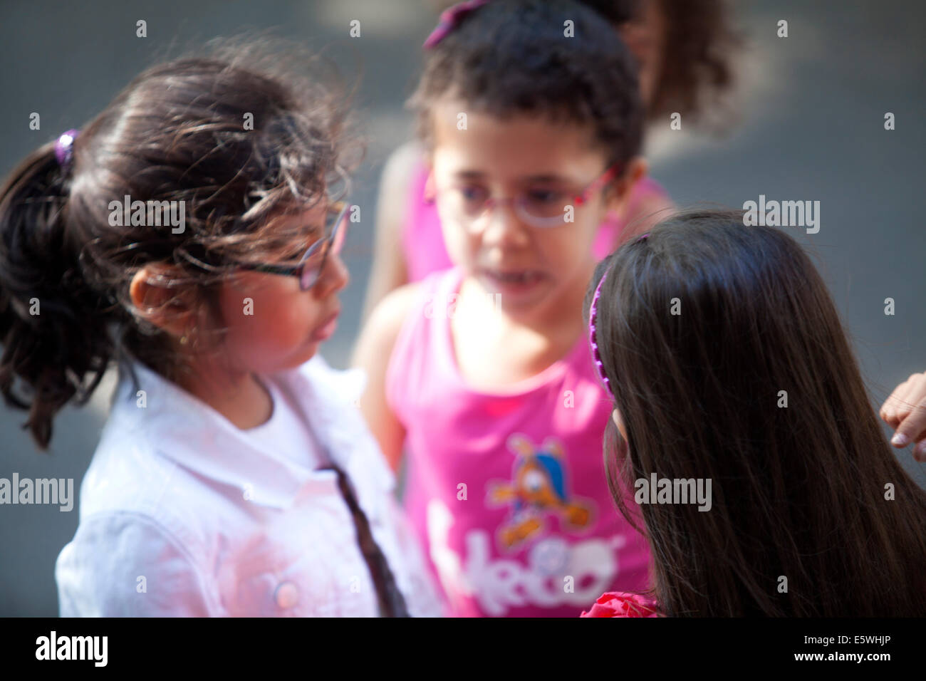Boy and girl talking outside school hi-res stock photography and images ...
