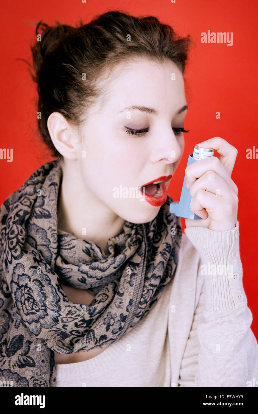 Asthma treatment, woman Stock Photo - Alamy