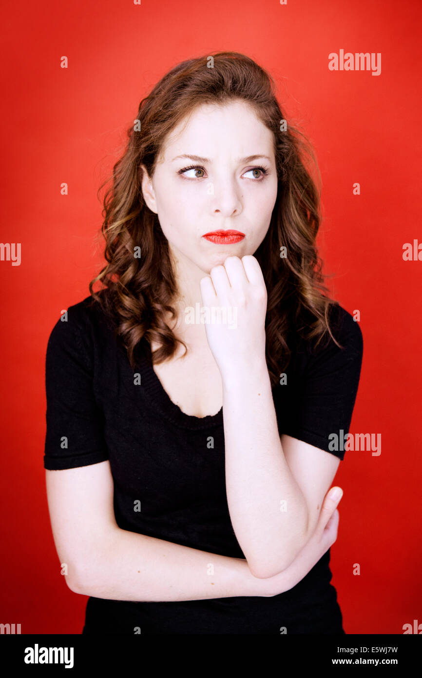 Woman with questioning expression hi-res stock photography and images ...