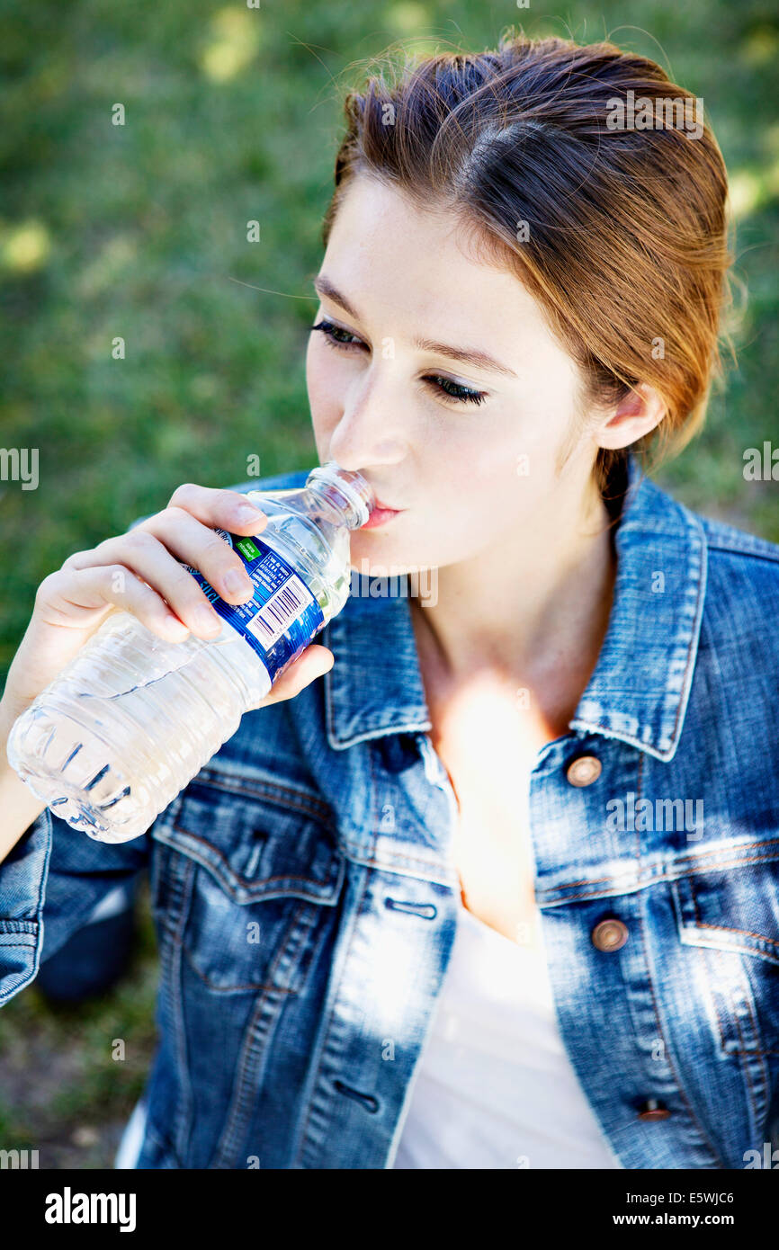 Woman with cold drink Stock Photo - Alamy