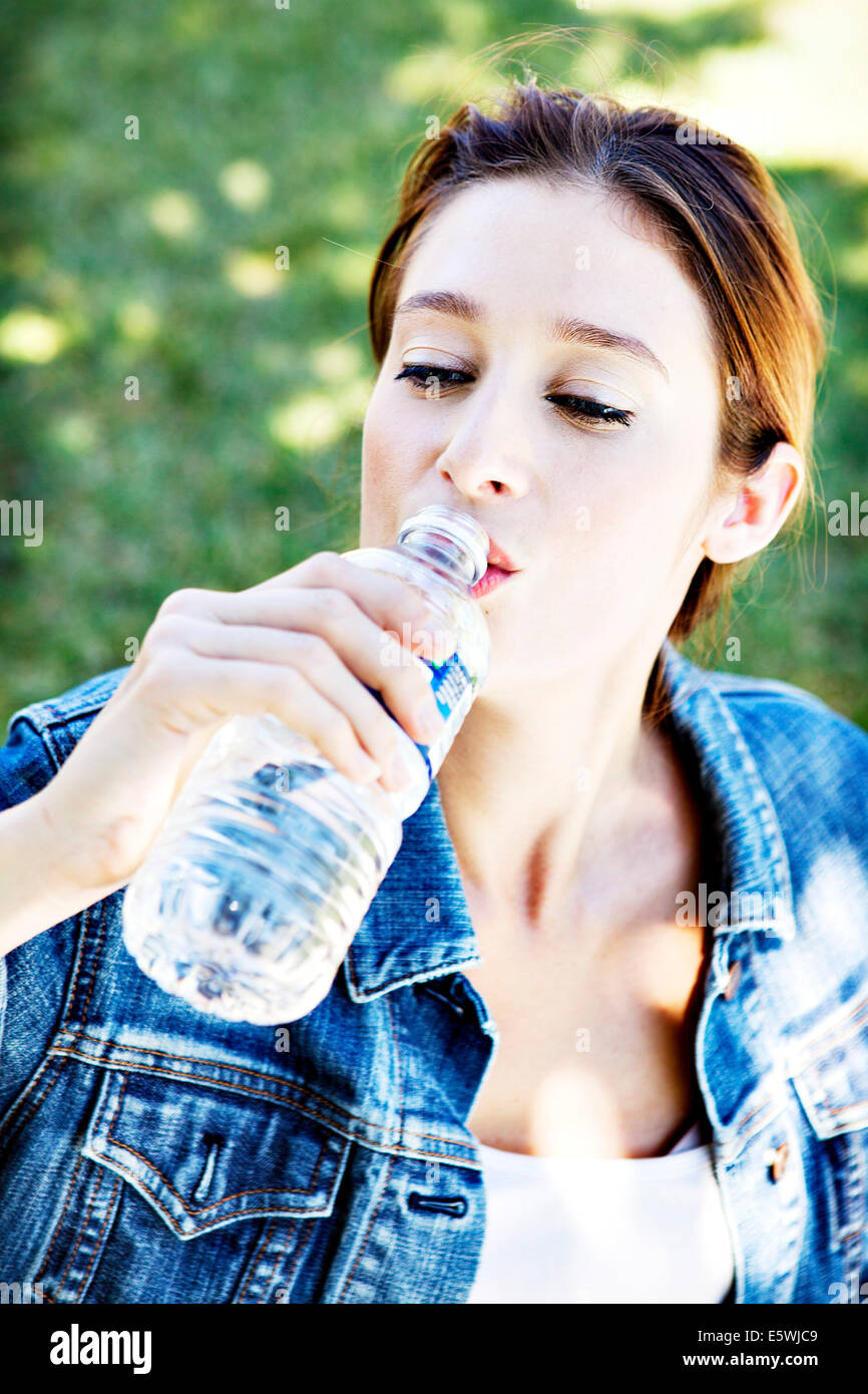 Woman with cold drink Stock Photo - Alamy