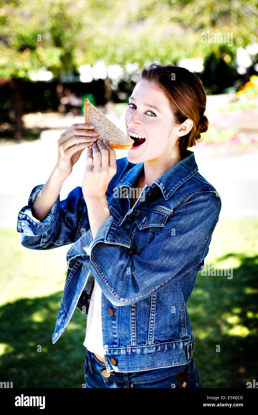Person eating sandwich hi-res stock photography and images - Alamy