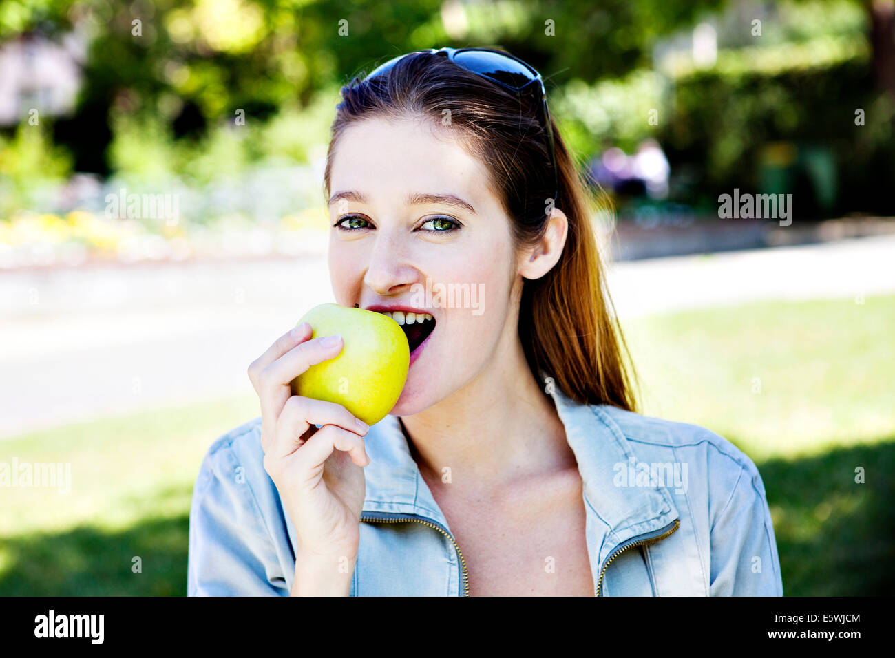 Old lady eating apple hi-res stock photography and images - Alamy