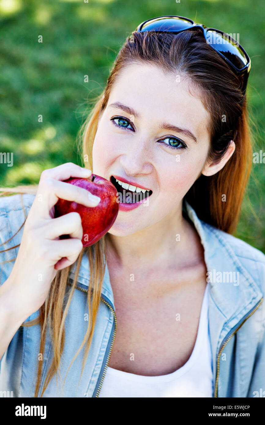 Woman Eating Apples Outside High Resolution Stock Photography and ...