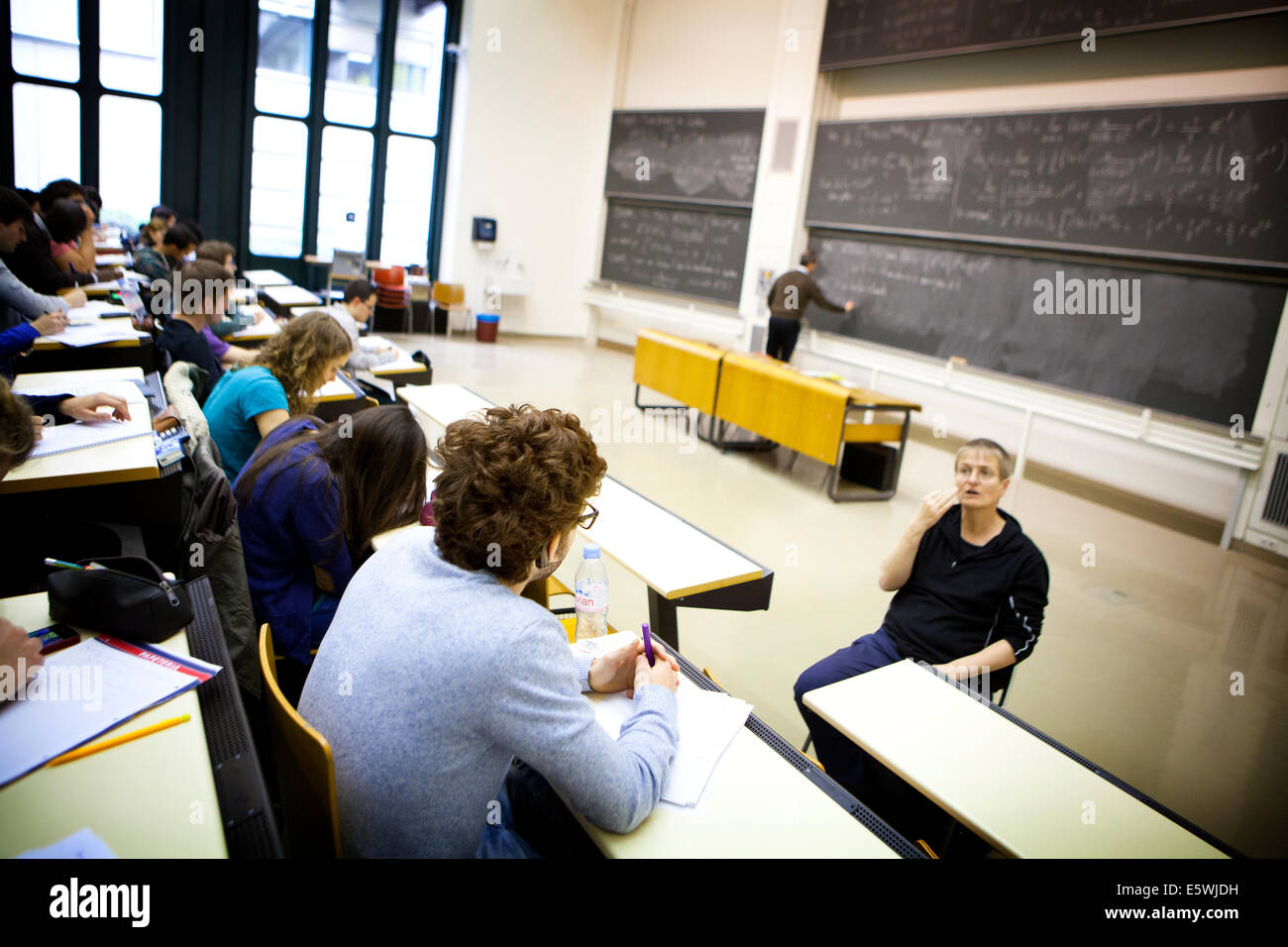 Teacher student hearing aid hi-res stock photography and images - Alamy