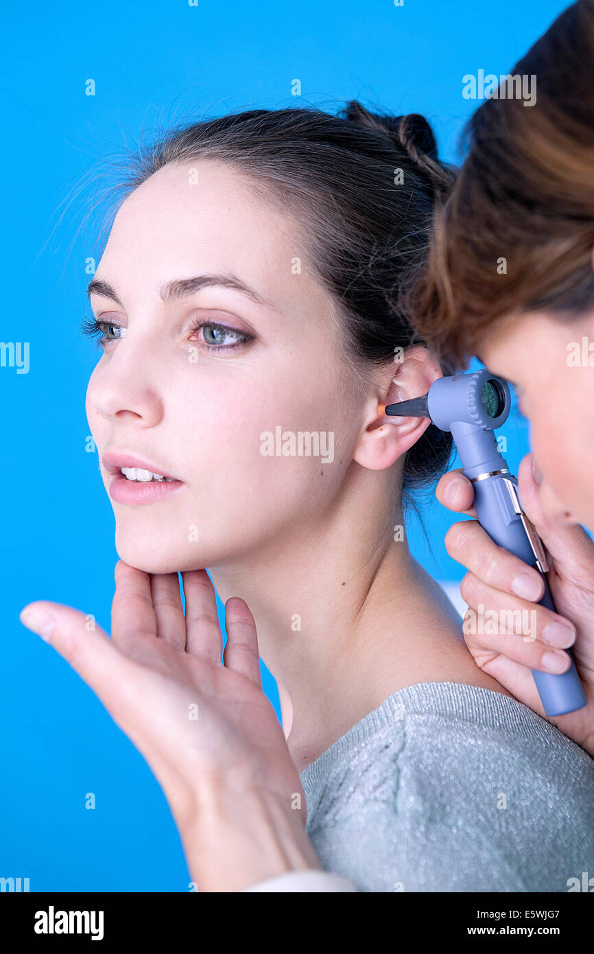 Throat exam doctor woman hi-res stock photography and images - Alamy