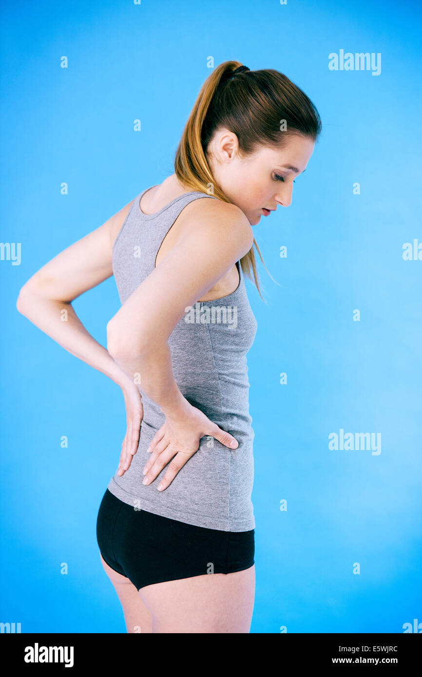 Lower back pain woman hi-res stock photography and images - Alamy