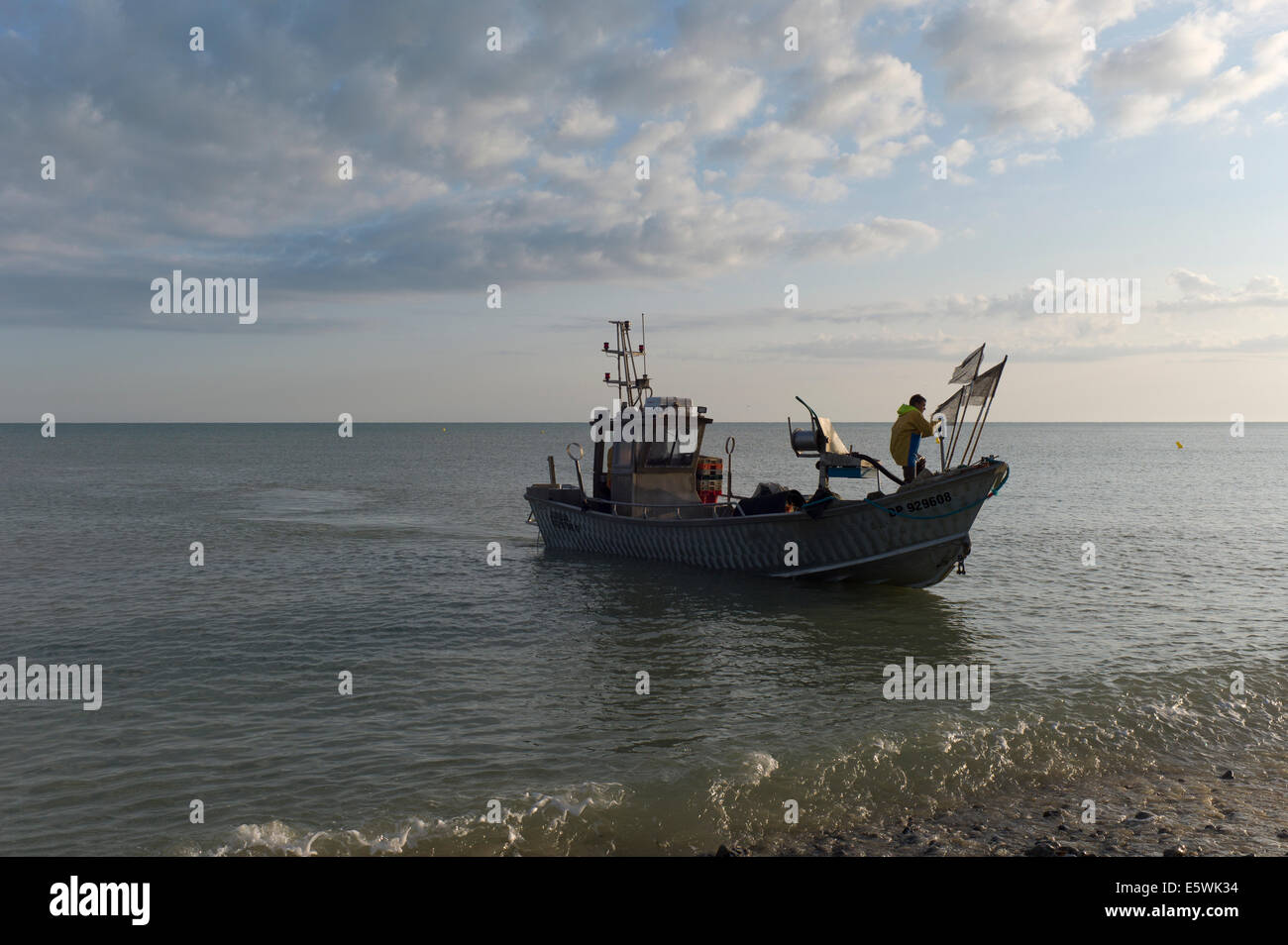 Fishing boat landing on beach, Normandy, France Stock Photo - Alamy