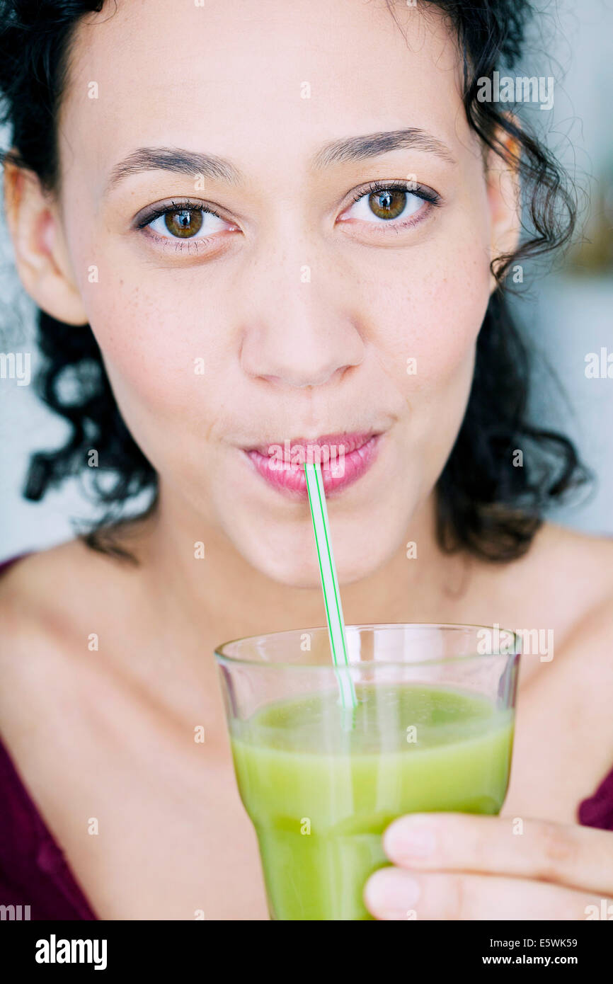 Woman with cold drink Stock Photo - Alamy