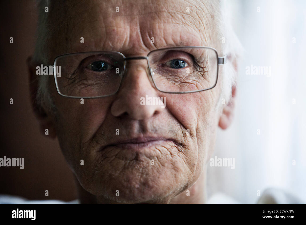 Elderly person indoors Stock Photo - Alamy