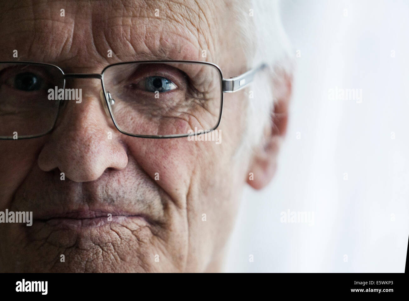 Elderly person indoors Stock Photo - Alamy