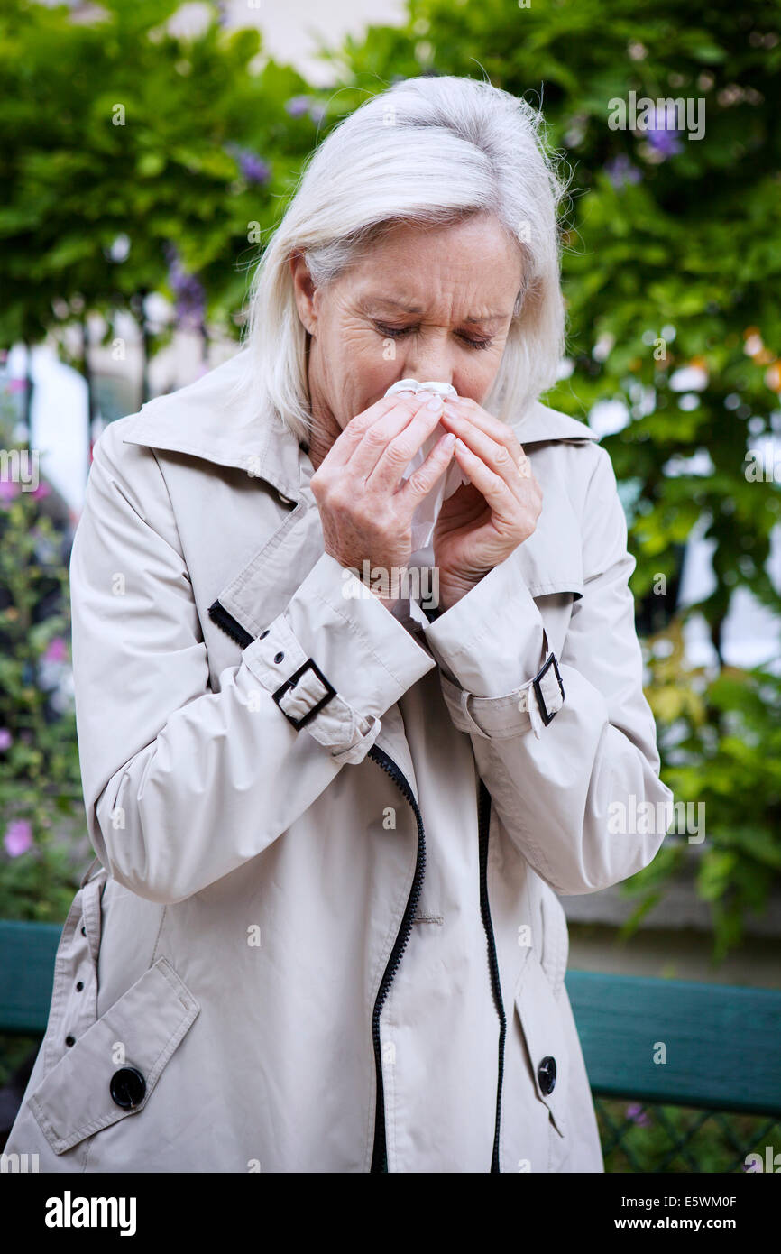 Elderly person with rhinitis Stock Photo - Alamy