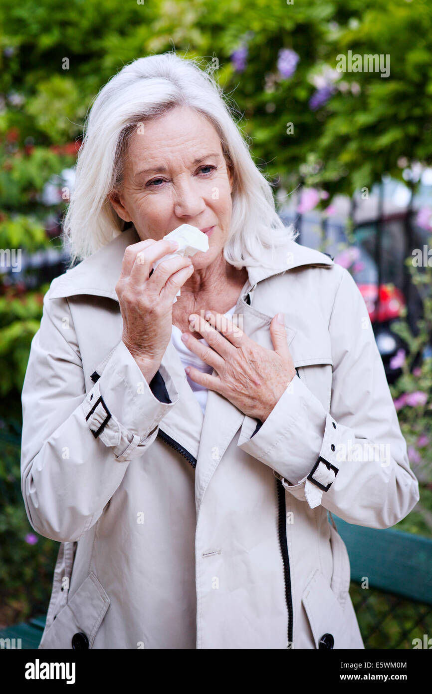 Elderly person with rhinitis Stock Photo - Alamy