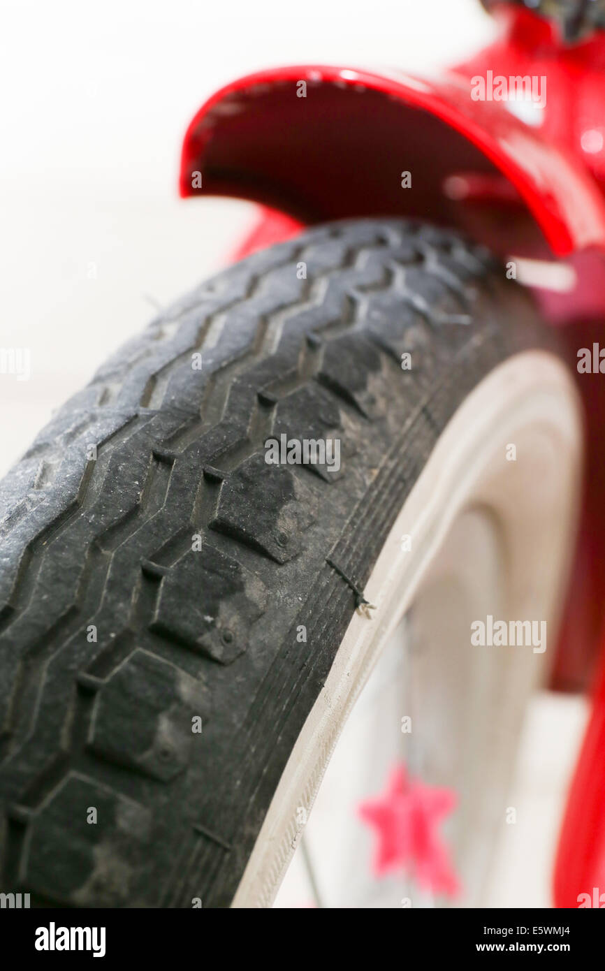 Rear tire on a small bicycle Stock Photo - Alamy