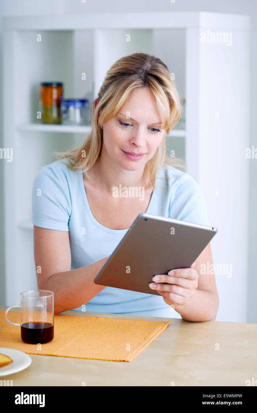 Woman with tablet Stock Photo - Alamy