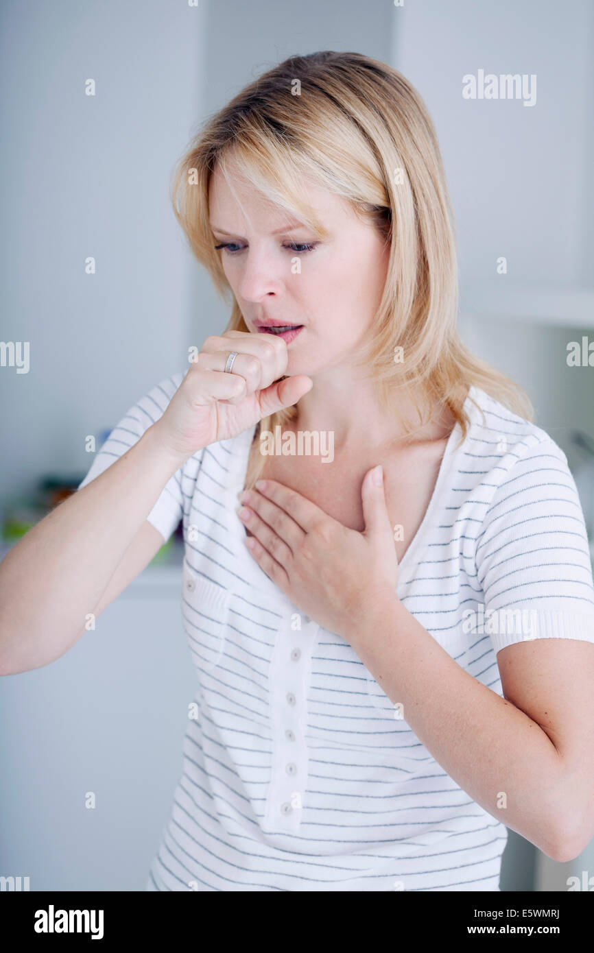 Coughing woman hi-res stock photography and images - Alamy