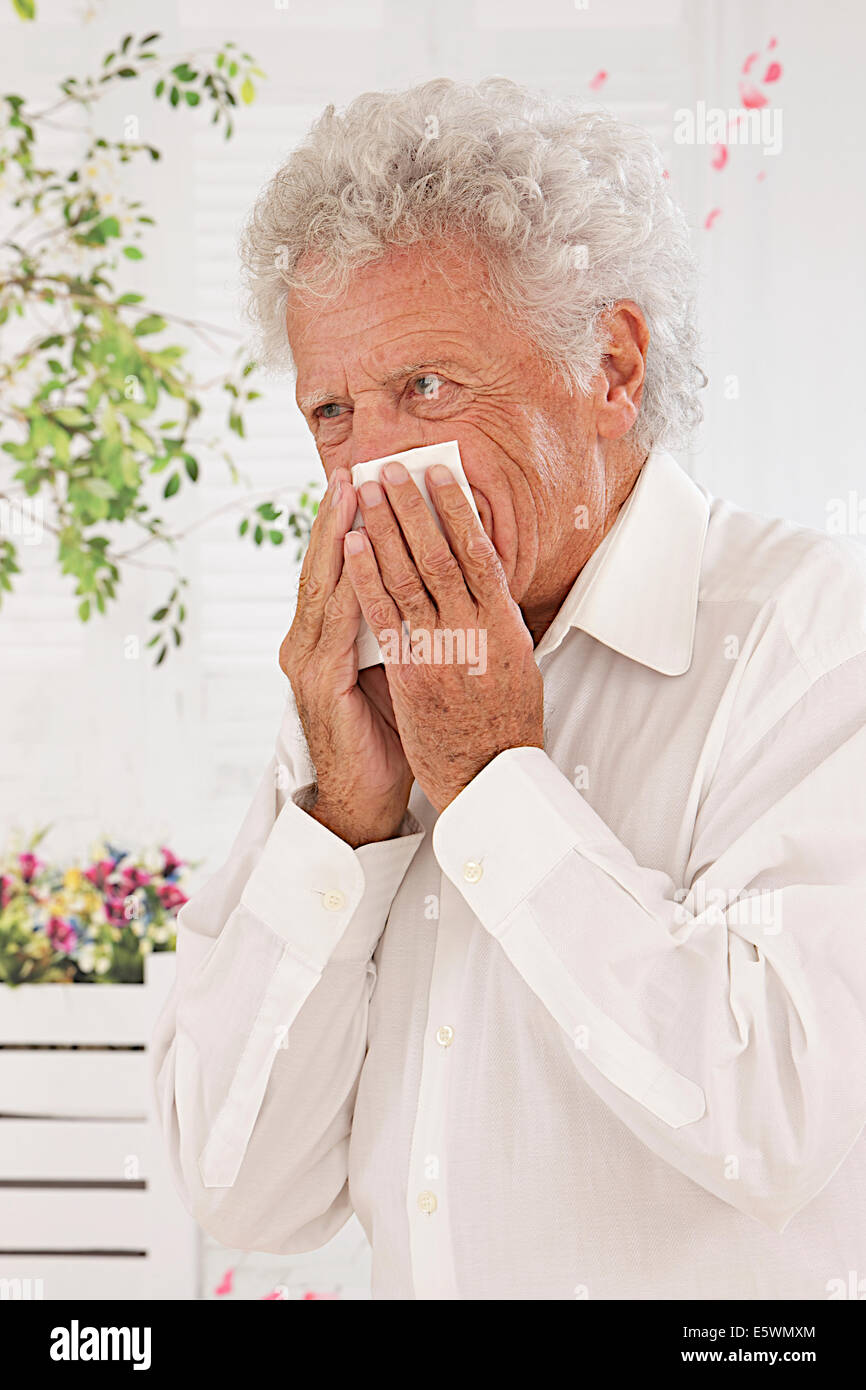 ELDERLY PERSON WITH RHINITIS Stock Photo - Alamy