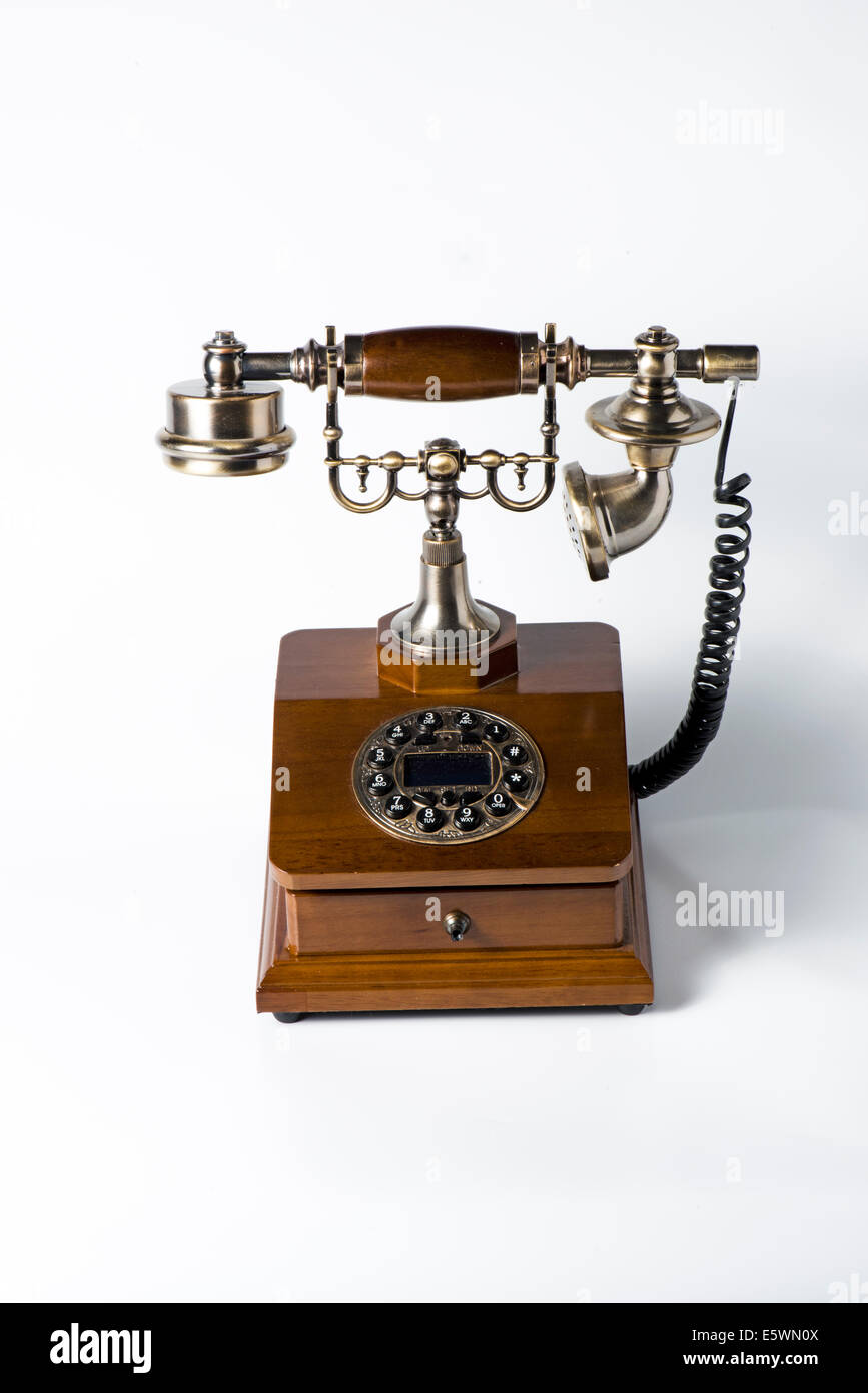 Old wooden phone on white background Stock Photo - Alamy