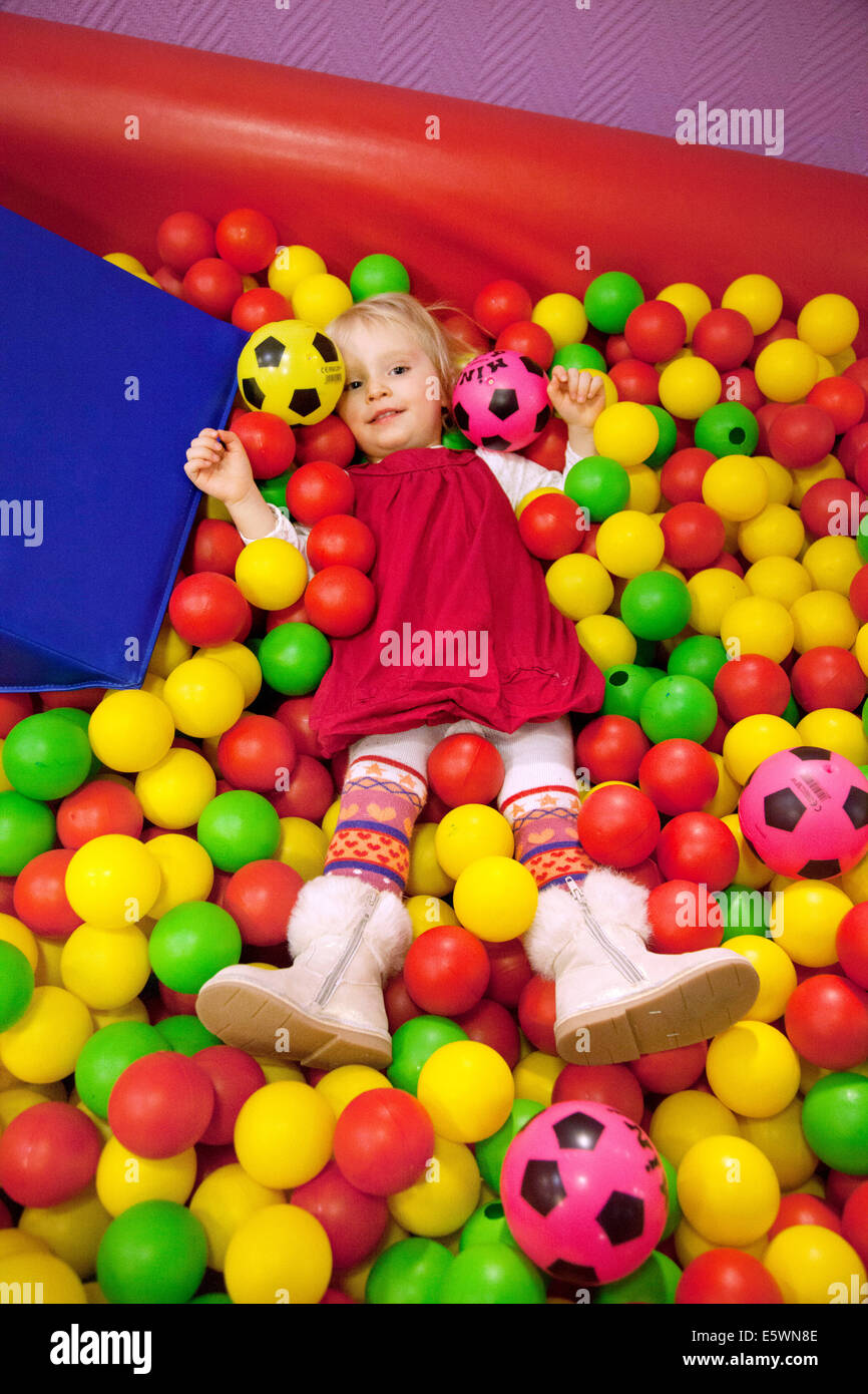 Child playing indoors Stock Photo - Alamy