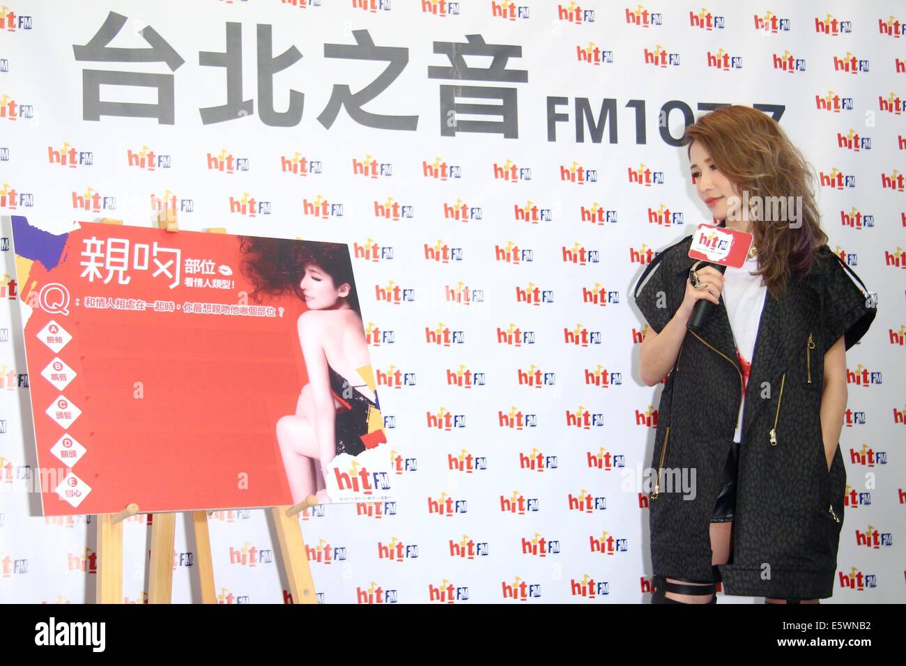 Taipei. 5th Aug, 2014. Singer Elva Hsiao attends new song promotional event in Taipei on Tuesday ...