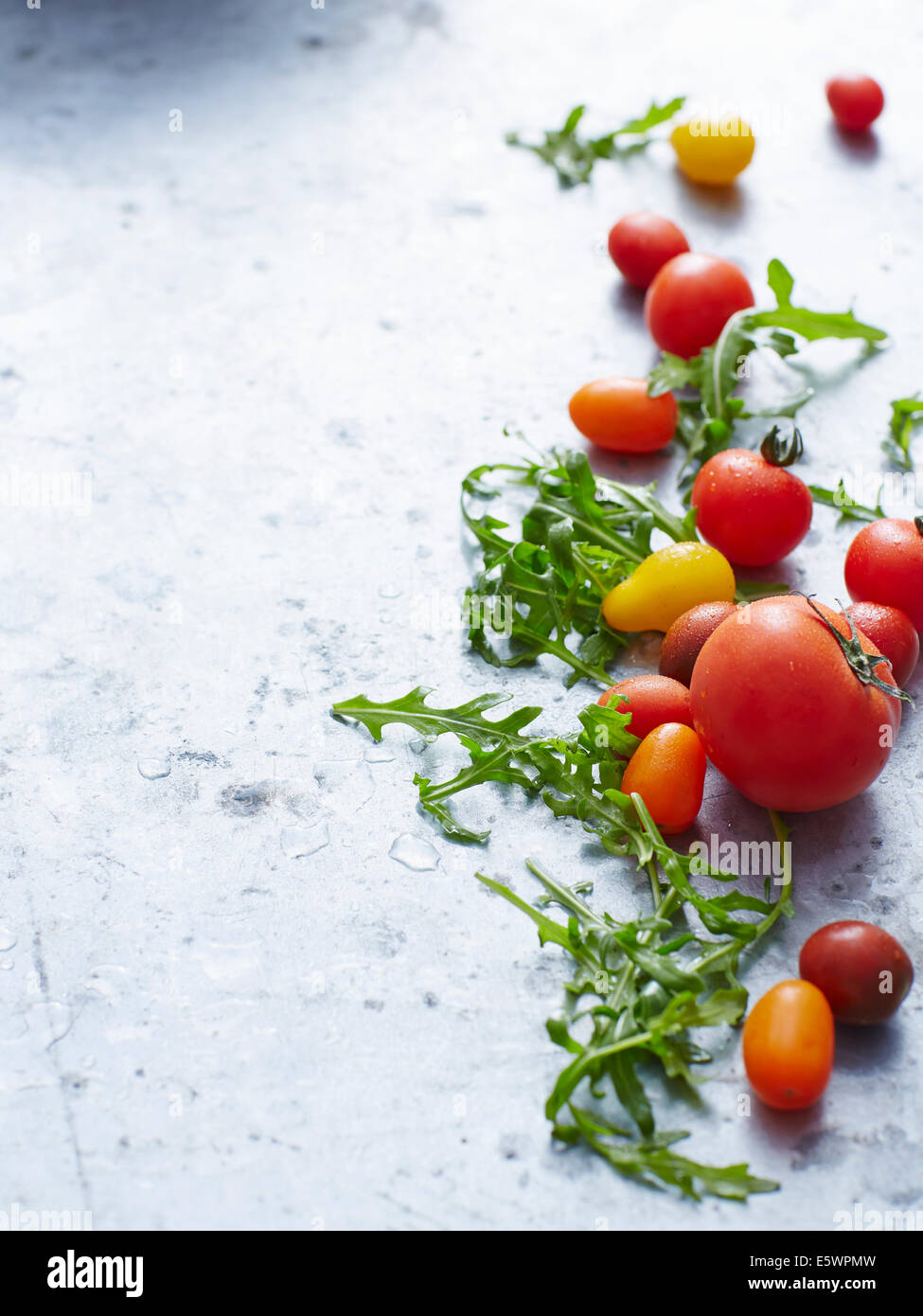 Tomato varieties with rocket Stock Photo - Alamy