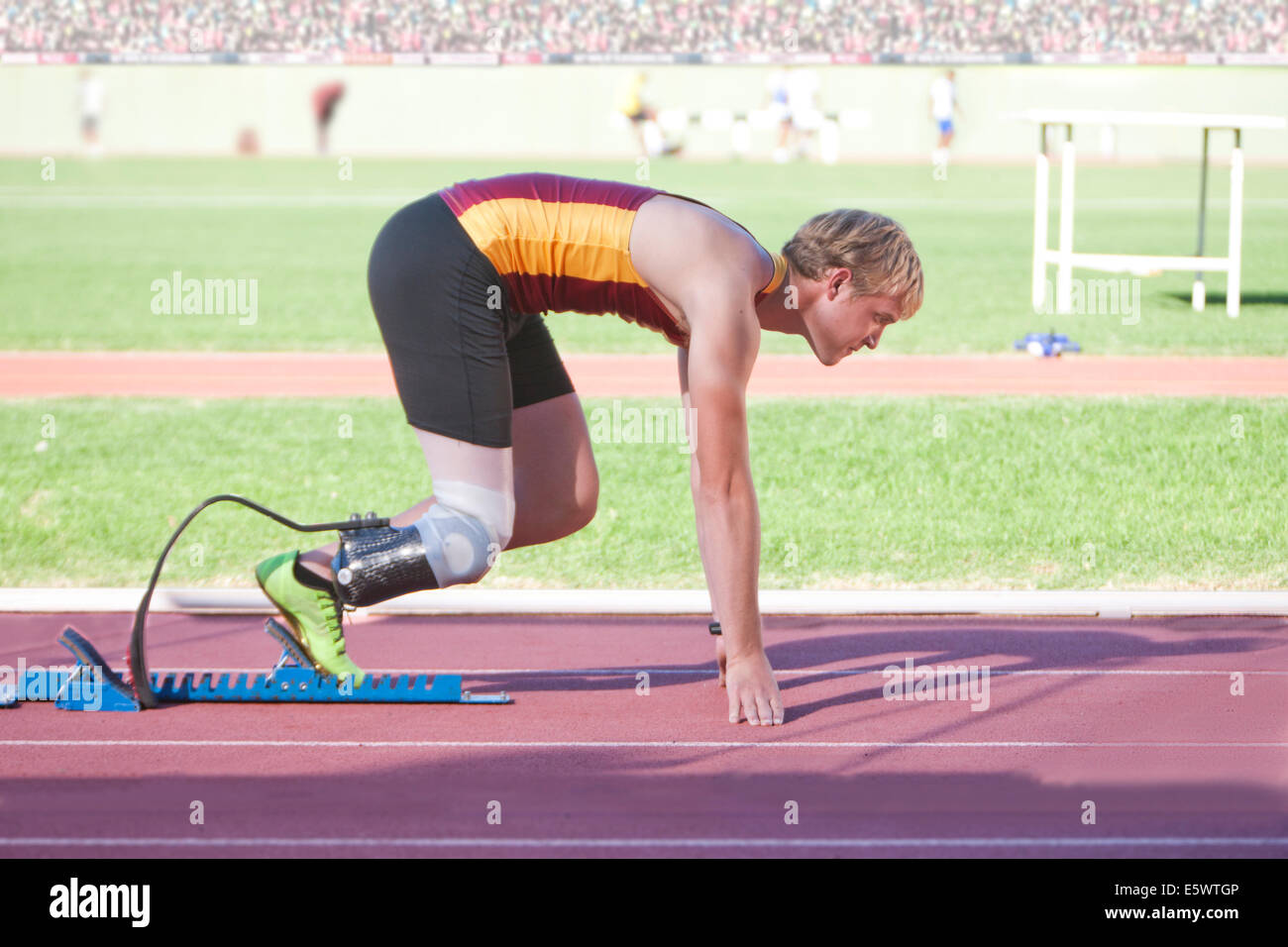 Sprinter in start position Stock Photo - Alamy