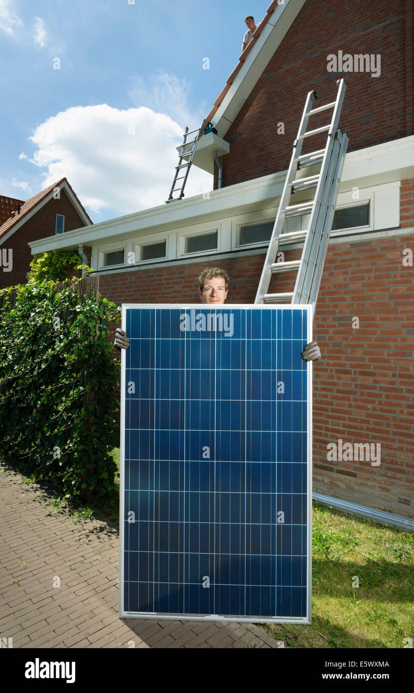 Installing solar panel hi-res stock photography and images - Alamy
